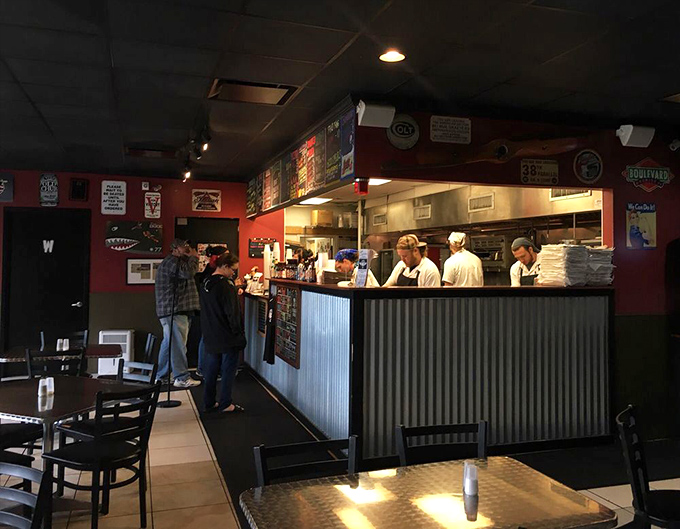 The counter where barbecue dreams come true. Notice the corrugated metal&mdash;a subtle warning that serious flavors await.