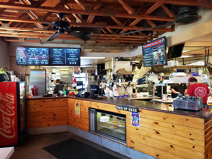 The counter &ndash; where barbecue dreams become reality. That pine paneling has witnessed countless first-bite expressions of pure joy.