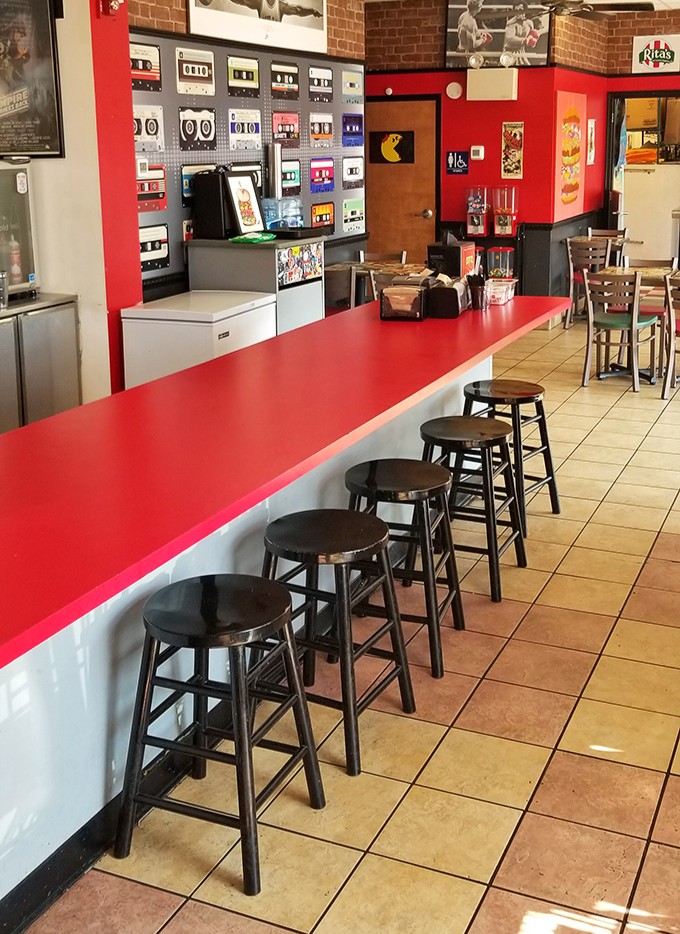 Where the magic happens—the open kitchen concept lets you watch your burger dreams become reality. Food theater at its finest.