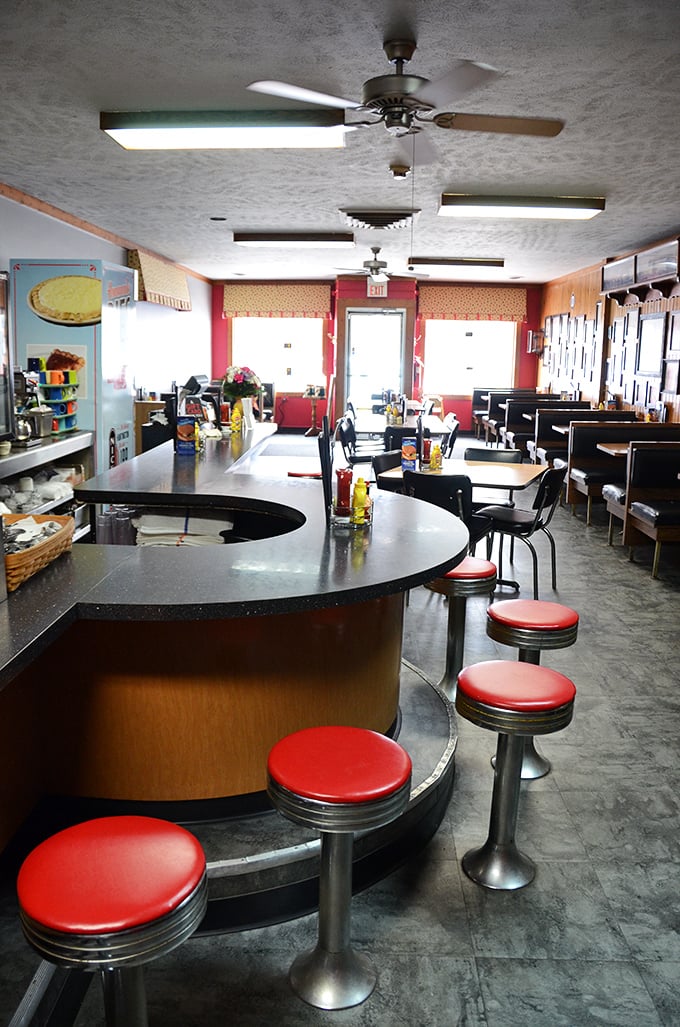 This counter isn't just a place to eat – it's front-row seating to a culinary performance that's been running for generations.