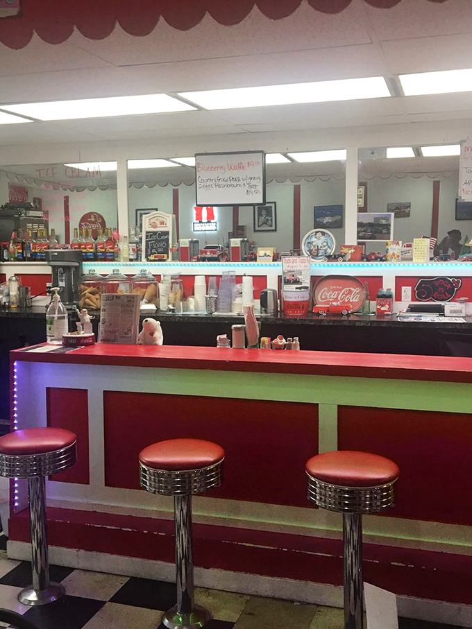 Counter seating: where strangers become friends over coffee refills and the shared religion of perfectly crispy hash browns.