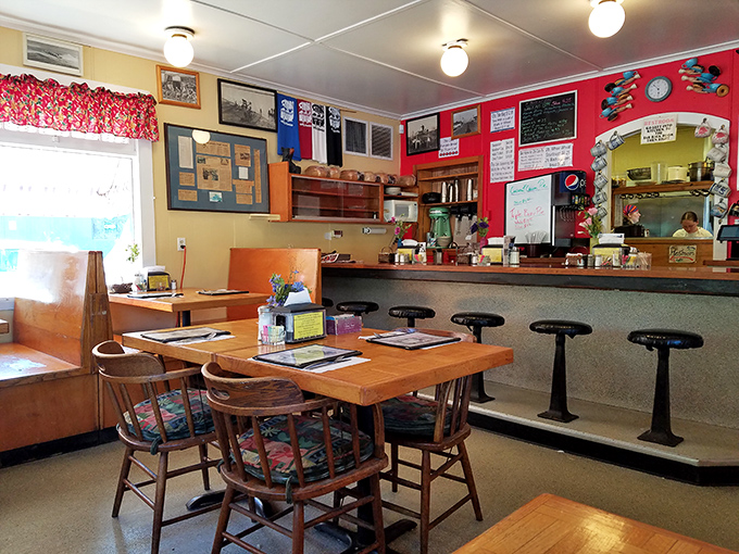 The counter seating where regulars perch and newcomers get the inside scoop on what to order. Red walls showcase local memorabilia that tells stories without saying a word.