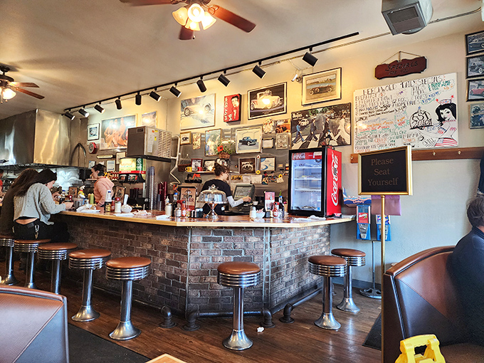 Counter seats offer front-row tickets to the breakfast show. These stools have supported generations of Ohioans seeking the perfect omelet.