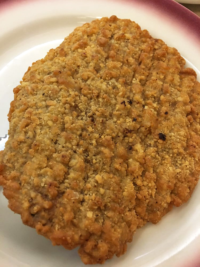 Country fried steak that your cardiologist wouldn't approve of but your soul absolutely requires. Comfort food that comforts without pretension.
