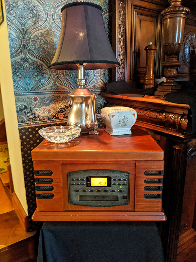 Vintage meets medieval in this charming corner, where modern music plays from an antique-styled Crosley in a centuries-old setting.