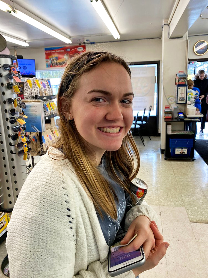 The interior captures the genuine deli experience where customers become regulars and regulars become family.