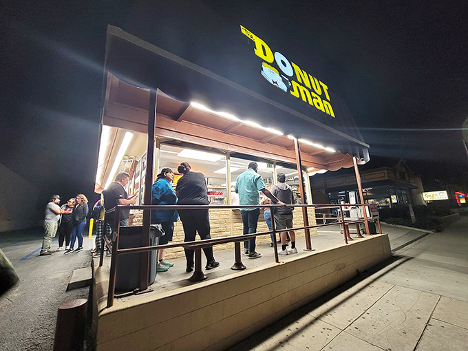 Even at night, the faithful line up for their donut fix. Some addictions are worth embracing, especially when they involve fresh strawberries.