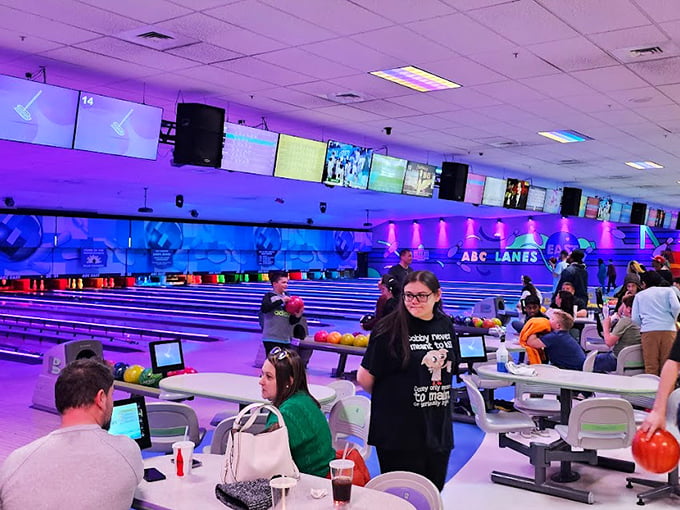 Cosmic bowling transforms the alley into a neon wonderland where even gutter balls look spectacular under the pulsating lights.