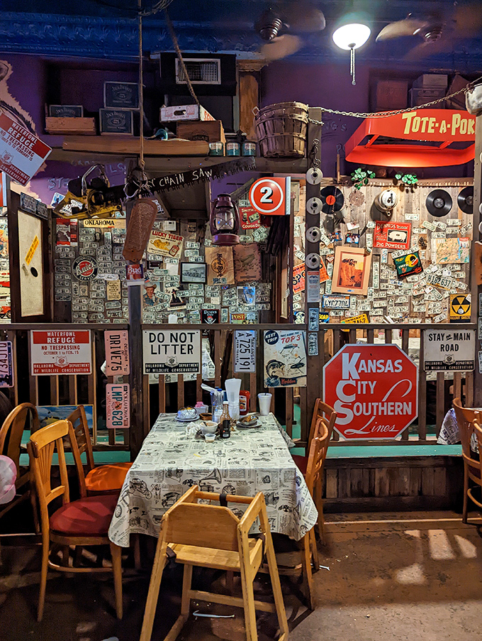 Dollar bills, road signs, and vintage memorabilia create a visual feast that competes with the actual food. America's attic never looked so appetizing.