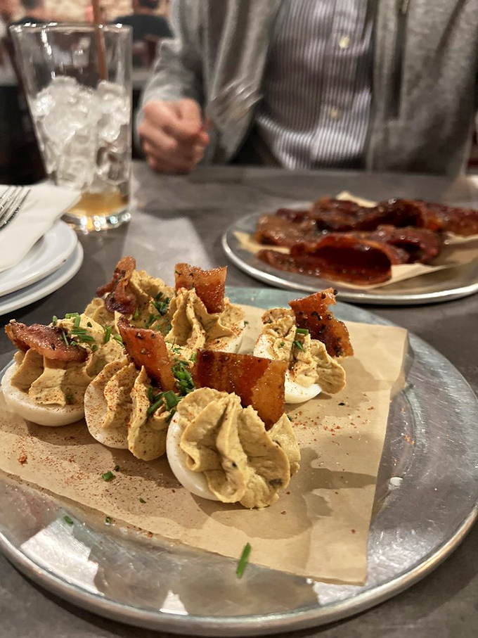 Deviled eggs elevated to art form with bacon crisps &ndash; because sometimes the appetizer steals the show before the main act even begins.