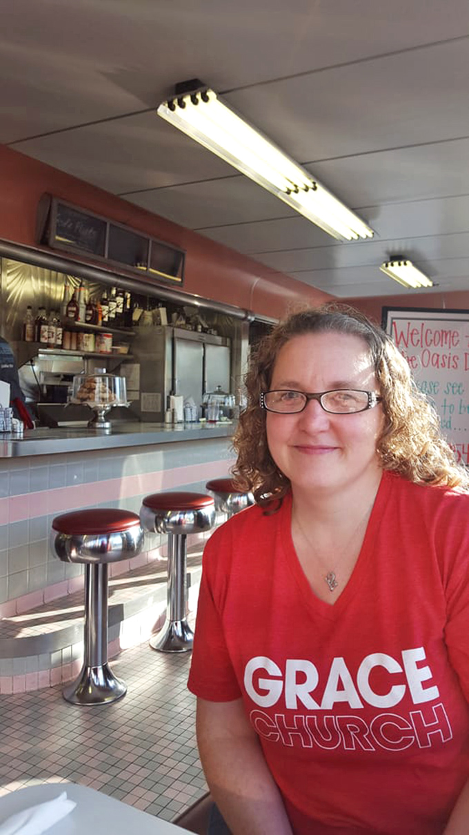 The handwritten "Welcome to Oasis" sign reminds us that the best dining experiences come with genuine hospitality, not just good food.