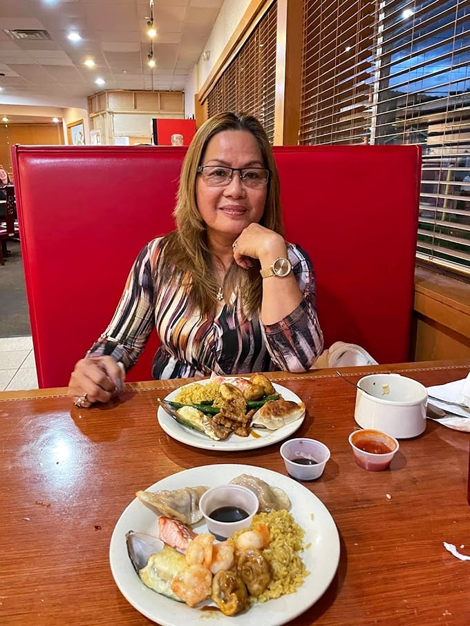 A diner showcases her strategic plate-building skills&mdash;the hallmark of buffet veterans who understand the delicate art of selection.