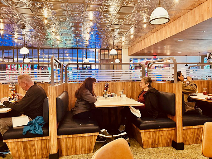 The ornate metal ceiling tiles catch the light and your attention&mdash;Liberace would approve of this subtle Vegas shimmer above sandwich heaven.