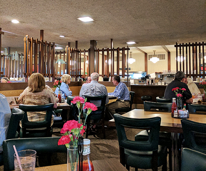 The dining room buzzes with the happy murmurs of people having religious experiences with comfort food classics.