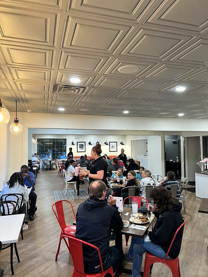A dining room filled with happy eaters&mdash;the universal language of good food translates to smiles and animated conversation across every table.
