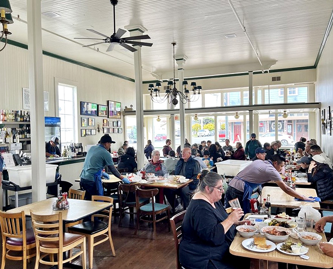 A dining room buzzing with the happy sounds of people making food memories. Notice how nobody's looking at their phones? That's the power of great seafood.