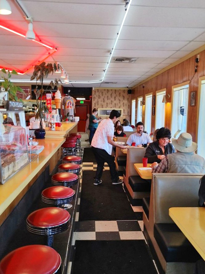 Where locals and tourists commune over comfort food, creating a symphony of satisfied murmurs punctuated by the occasional fork drop.