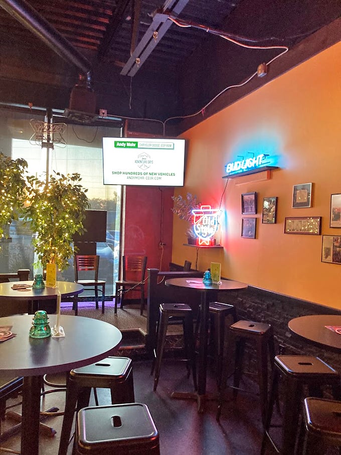 The bar area combines casual comfort with neighborhood charm. Those neon signs aren't trying to be trendy&mdash;they've earned their place through years of service.