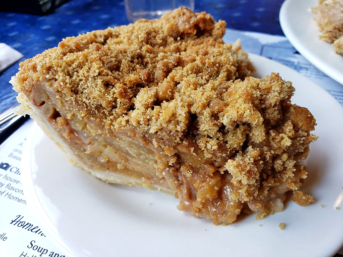 Dutch apple pie with that perfect crumb topping &ndash; the kind of dessert that makes you contemplate moving to Amish country permanently.