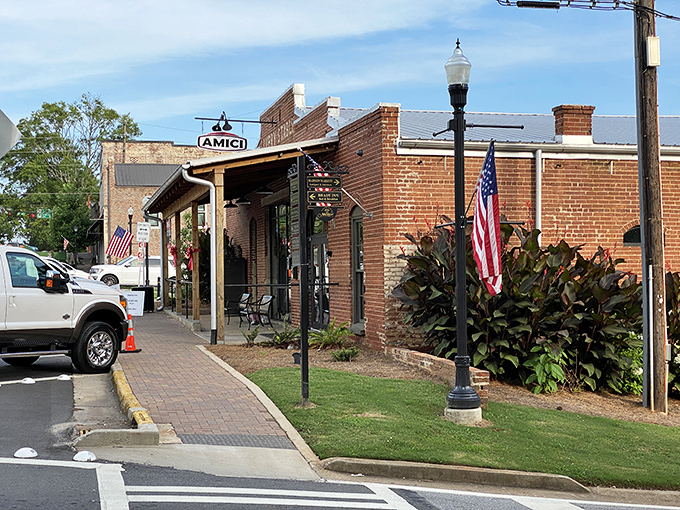 The sidewalks of Madison invite you to linger, with American flags and carefully tended plants creating that "won't you stay awhile" atmosphere.