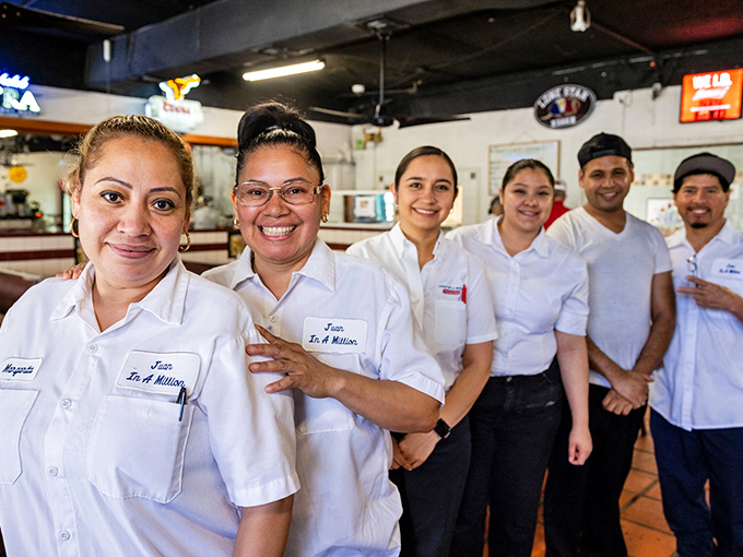 The team behind the magic, wearing smiles as warm as their fresh tortillas. These breakfast ambassadors turn first-timers into regulars with every plate.
