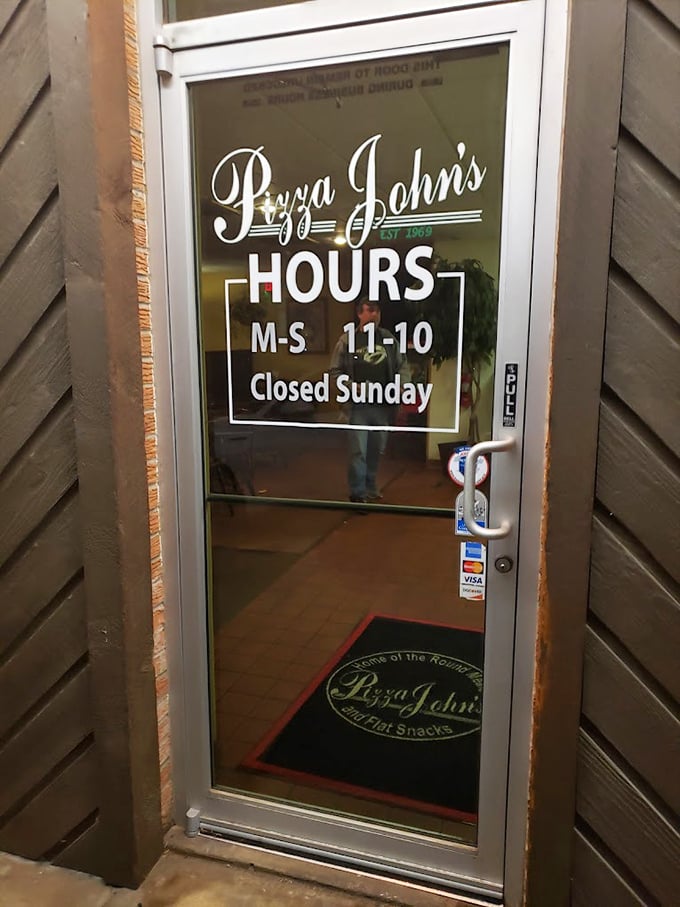 The entrance door, with its "Est. 1969" notation, has welcomed generations of Derby residents seeking pizza perfection.
