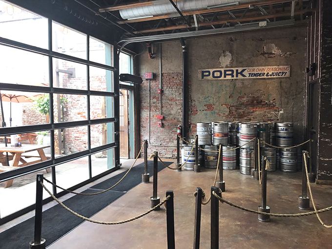 Industrial chic meets meat market. Those kegs aren't just decoration&mdash;they're a reminder that good barbecue demands good beer.