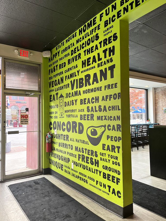 The entrance wall's word cloud isn't just decoration&mdash;it's a roadmap to the restaurant's soul, with "HEALTH," "VIBRANT," and "BURRITO" leading the way.