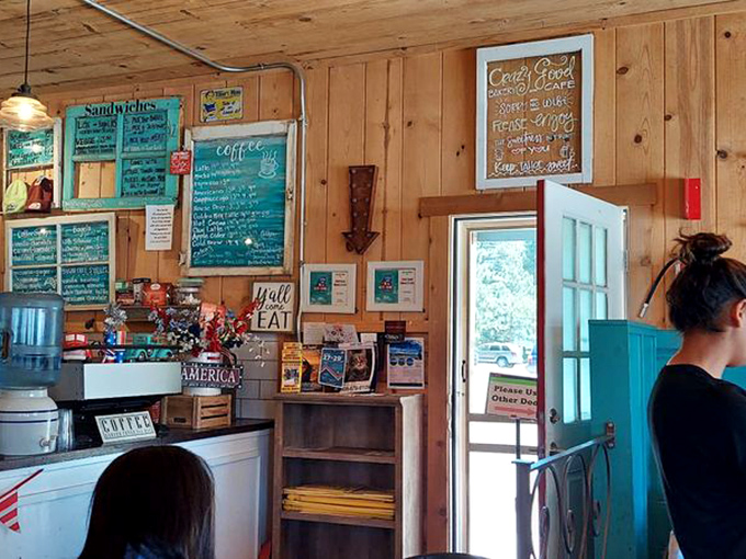 The pine-paneled walls and menu boards create that rare atmosphere where calories consumed while on vacation technically don't count.