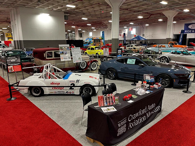 The docent's animated storytelling transforms these mechanical marvels into characters in America's ongoing love affair with the automobile.