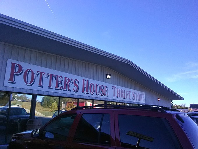 As evening approaches, Potter's House still draws a crowd. The red lettering glows with promise&mdash;tomorrow's inventory will be completely different.
