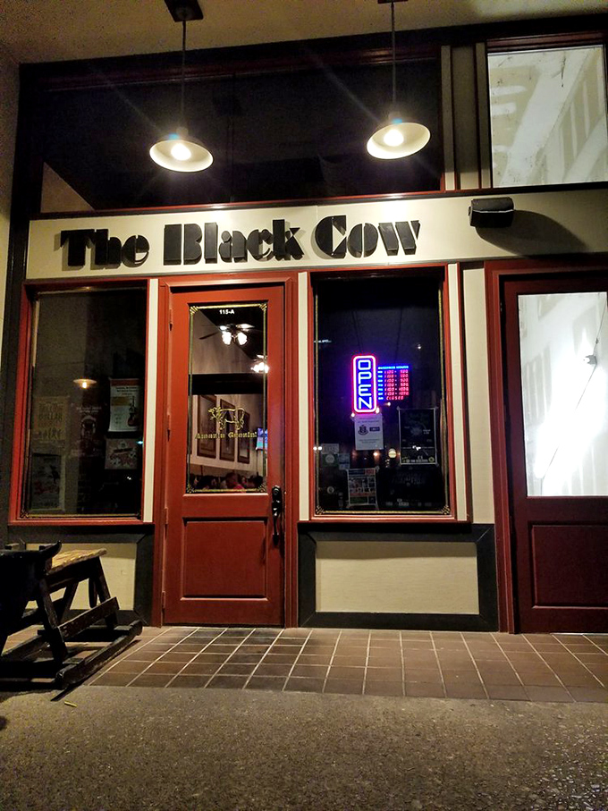 As night falls, The Black Cow's neon glow becomes a lighthouse for the hungry, beckoning like a delicious North Star.