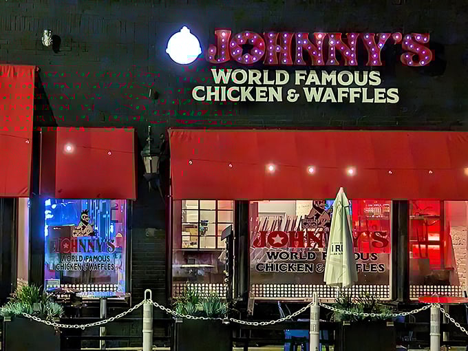 As night falls, Johnny's transforms into a glowing red temple of comfort food worship. The chicken calls, and the faithful answer.