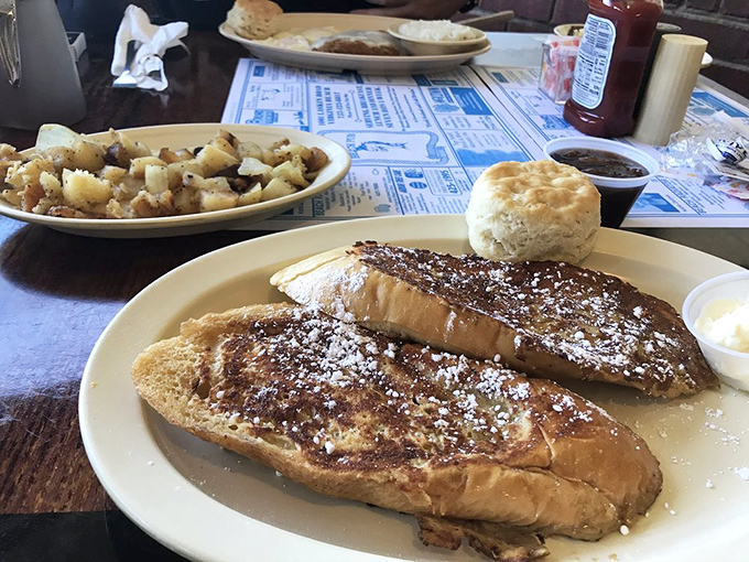 French toast that's been dipped, griddled, and powdered into breakfast nirvana. Those potatoes are playing no second fiddle.