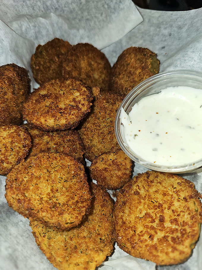 Fried pickles that achieve the impossible: maintaining their crunch while delivering that vinegary punch. The perfect beer companion doesn't exi—oh wait, here it is.