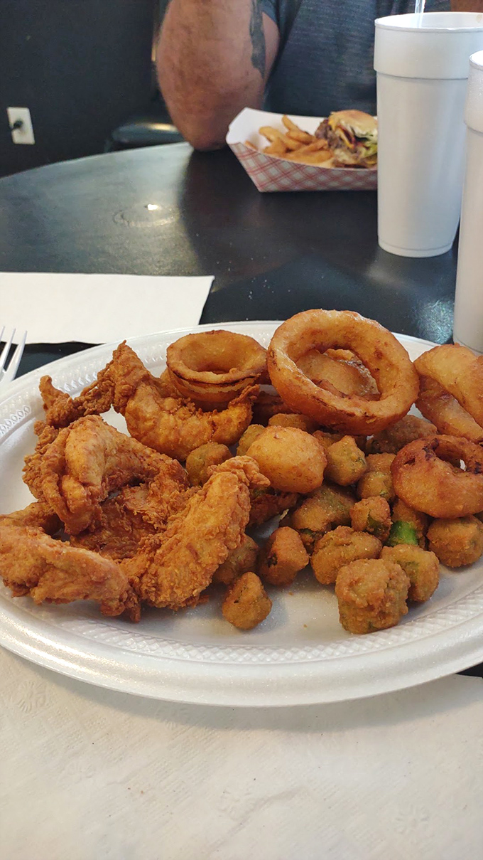 A golden fleet of fried shrimp, onion rings, and okra&mdash;proof that sometimes the best seafood is found miles from any ocean.
