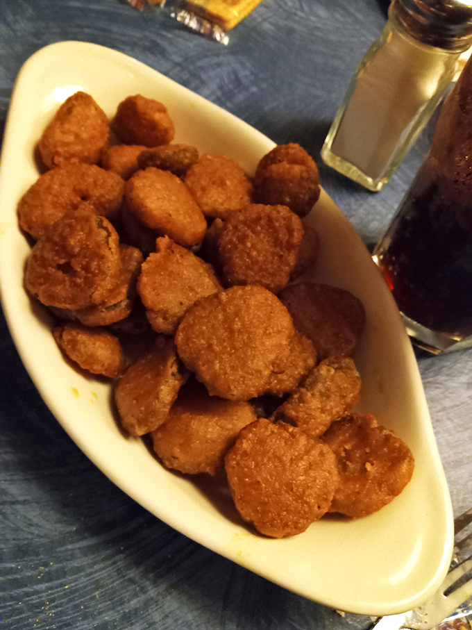 These aren't just fried pickles; they're crunchy little flavor bombs that make the perfect opening act before the meaty main event.