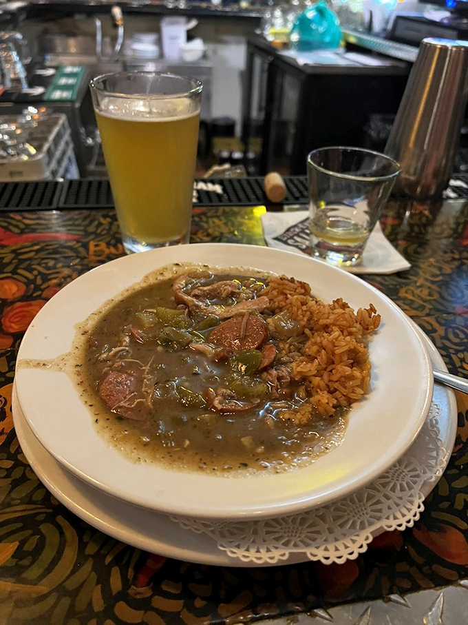 This gumbo, dark as Mississippi mud and twice as rich, comes with a side of dirty rice that's anything but dirty business.