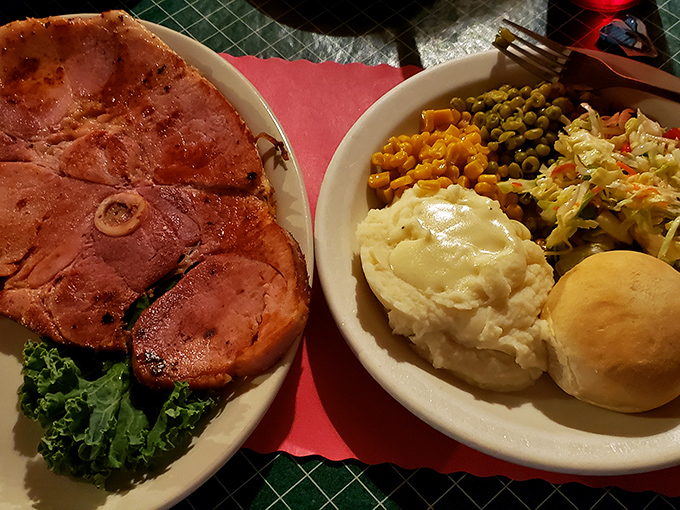 Meat and three sides&mdash;the universal language of satisfaction. That ham steak practically hangs off the plate like it's showing off.