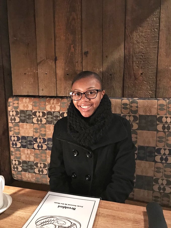 The patterned booth and wooden walls create the perfect backdrop for making memories over meals that matter.