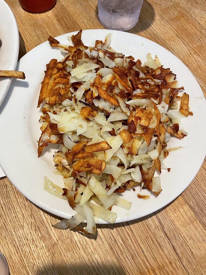 The hash brown masterpiece&mdash;part crispy, part tender, all delicious. Like a potato that went to art school and found its true calling.