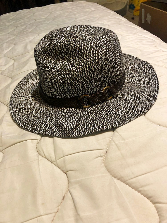 This black and white woven fedora isn't just a hat&mdash;it's your ticket to instant style credibility at backyard barbecues across Arizona.
