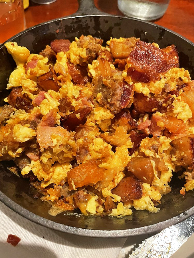Breakfast skillet that says "good morning" with authority. Bacon and eggs having their best day ever in cast iron.