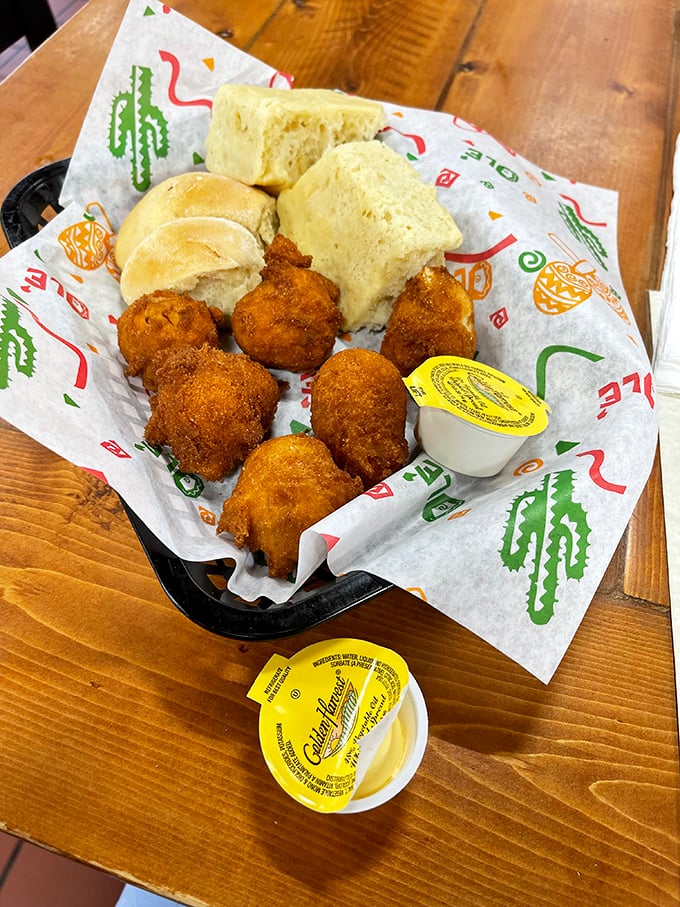 Hushpuppies and biscuits &ndash; the dynamic duo of Southern sides that silently say, "You're home now," with every buttery, golden bite.