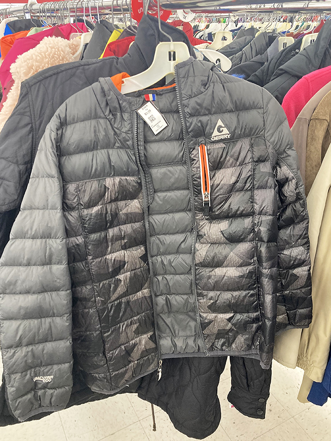 Winter is coming... eventually. This barely-worn puffer jacket waits patiently for cold weather and a new owner to appreciate its practical warmth.