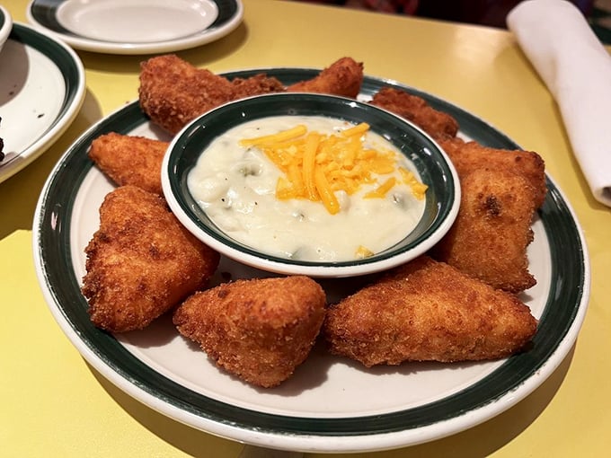 Jalape&ntilde;o cheese grits transformed into golden-fried treasures &ndash; because sometimes the best things in life need an extra layer of crispy.