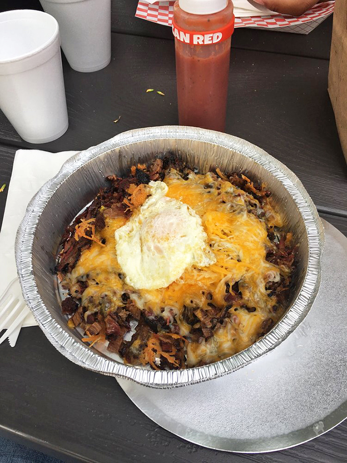 Breakfast meets barbecue in this glorious skillet of protein, cheese, and what appears to be a perfectly runny egg crown.