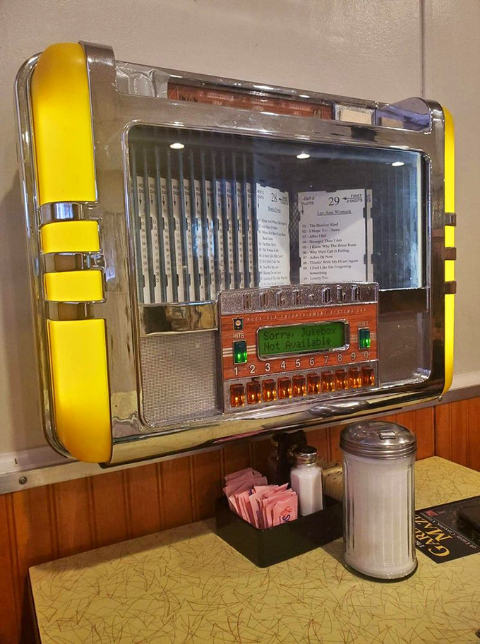 A vintage jukebox that's seen more quarters than a laundromat and still plays the soundtrack to your parents' first date.