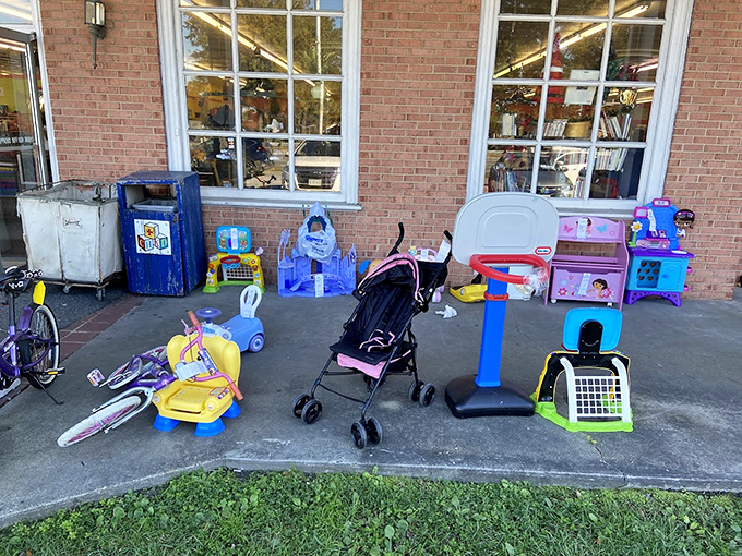 The sidewalk toy display&mdash;where childhood dreams get their second chance and parents find birthday presents that won't break the bank.