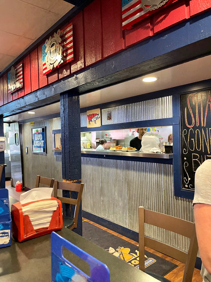 Where the magic happens: The kitchen pass reveals the heart of Hobos, where simple ingredients transform into Missouri comfort classics.